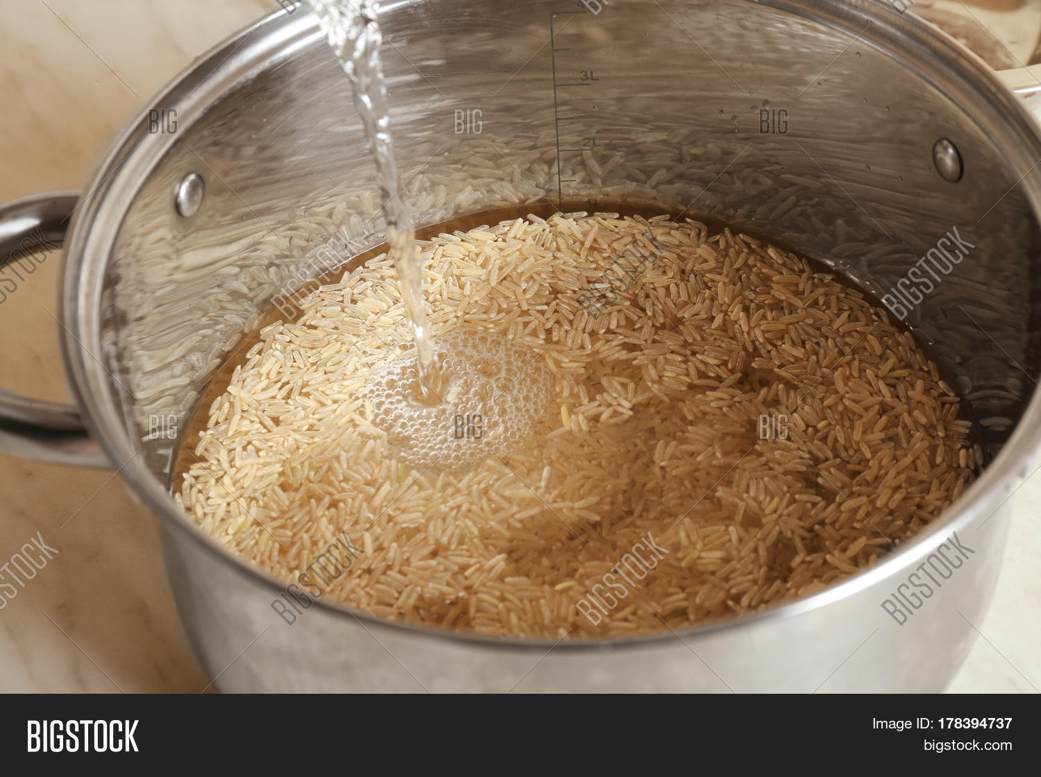 Pouring Water Into Pan Image & Photo (Free Trial) | Bigstock