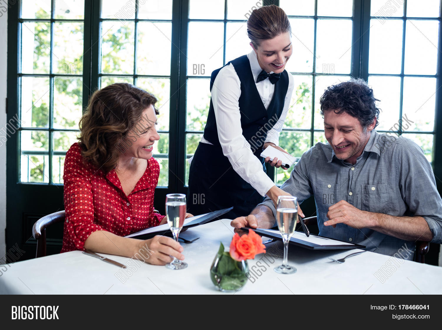Waitress Assisting Image & Photo (Free Trial) | Bigstock