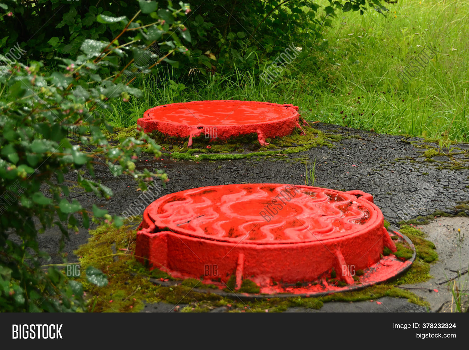 2 Wet Red Manholes Image & Photo (Free Trial) | Bigstock