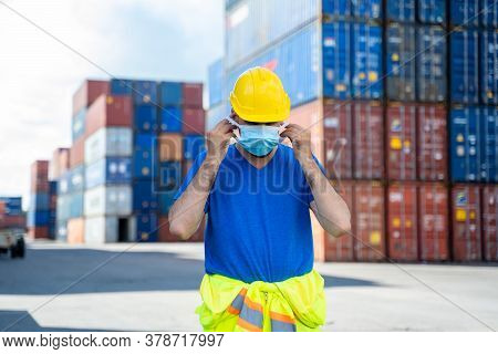 Container Worker Wearing Protective Mask To Protect Against Covid-19 ...