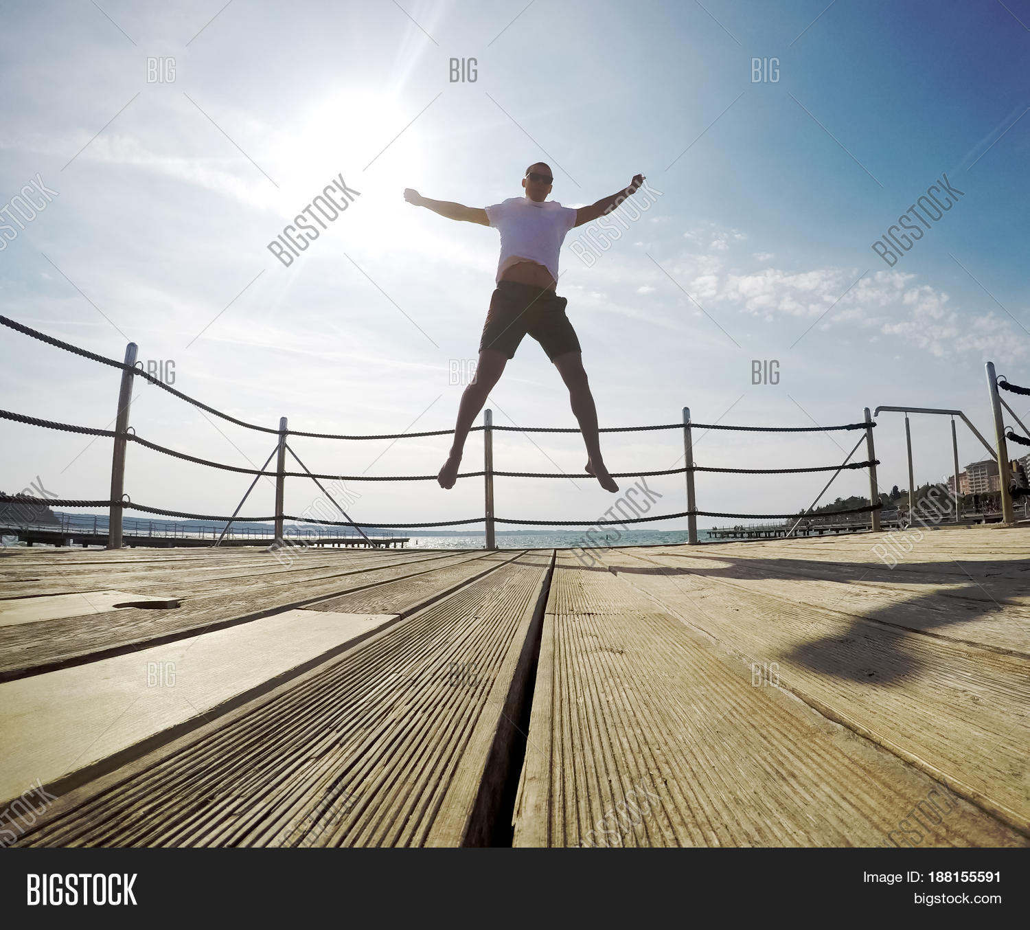 Young Man Jumping Image & Photo (Free Trial) | Bigstock