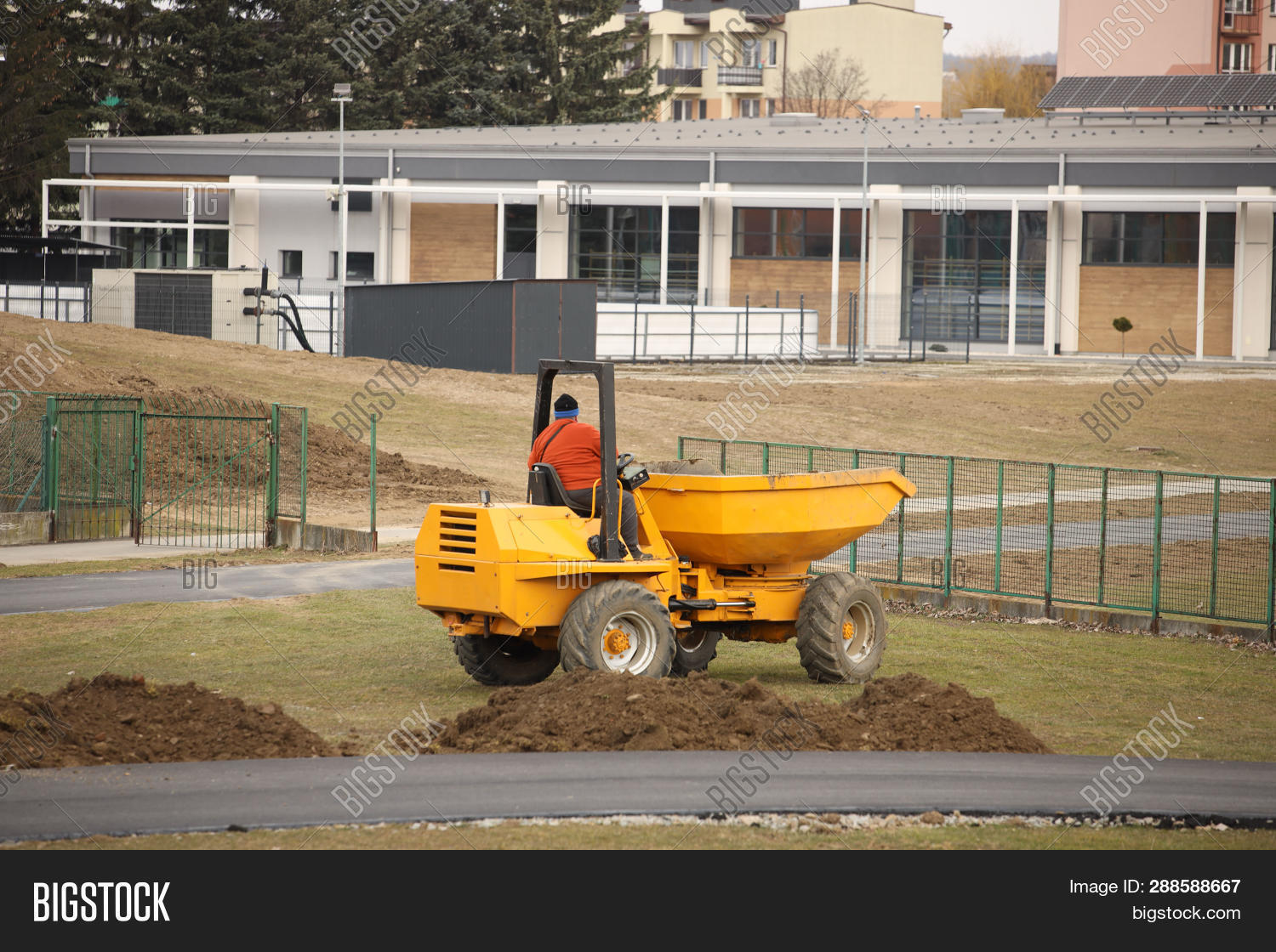 Worker On Small Orange Image & Photo (Free Trial) | Bigstock