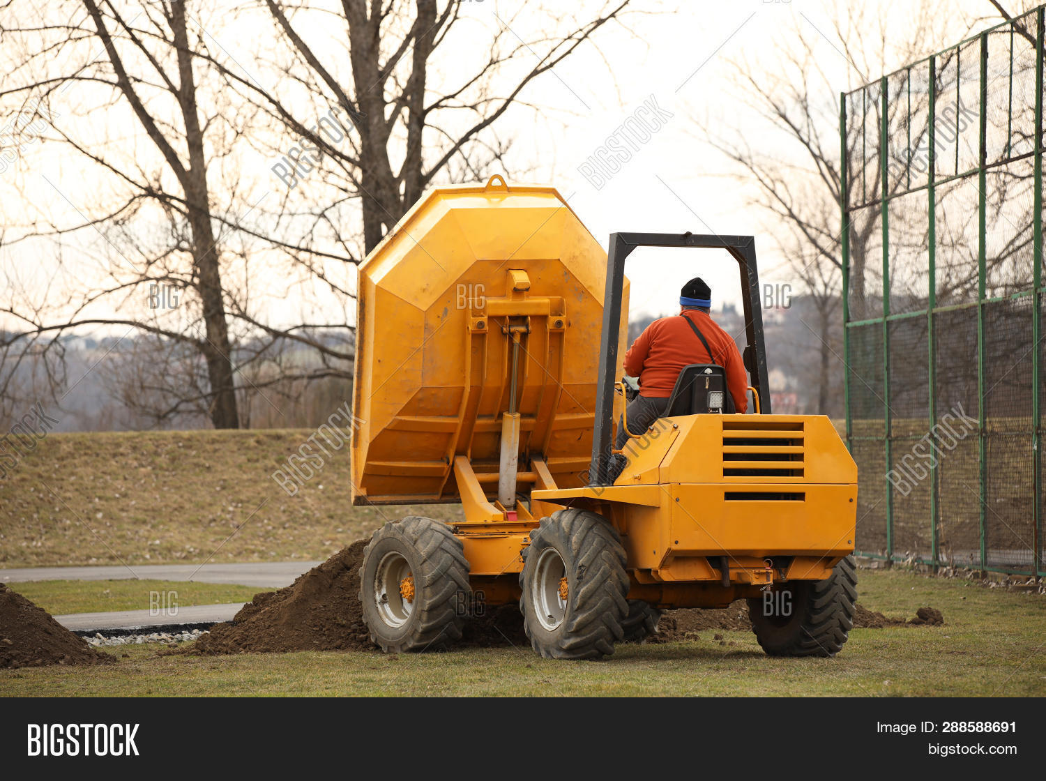Worker On Small Orange Image & Photo (Free Trial) | Bigstock