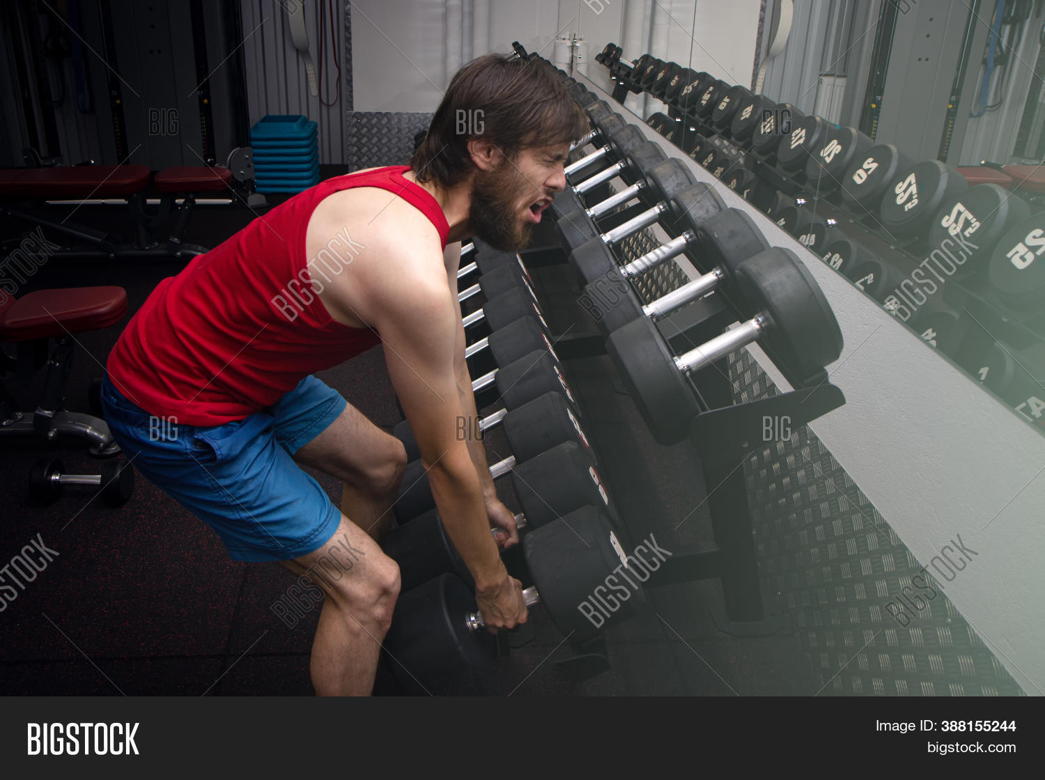 Weak Man Lifting Weights