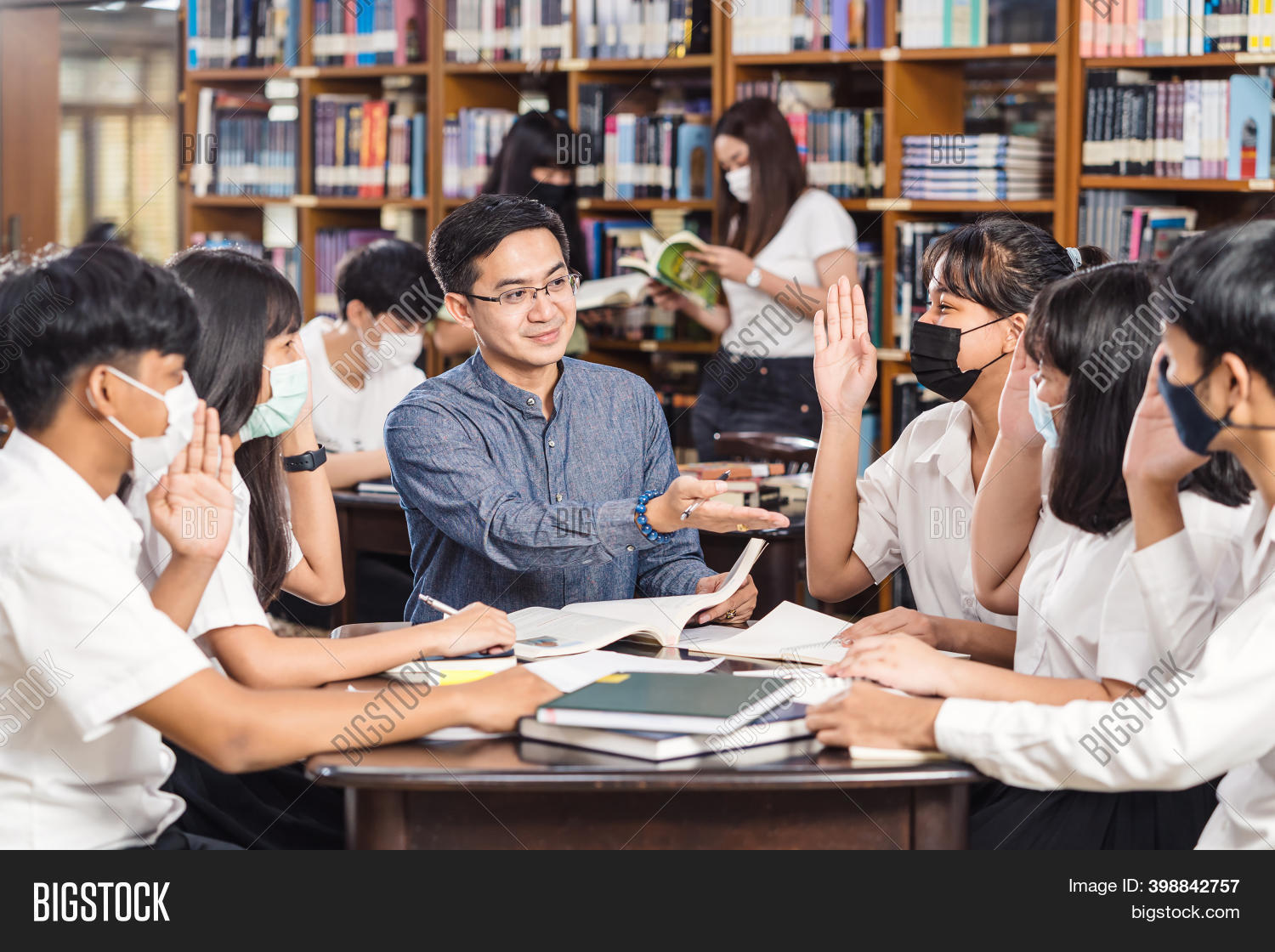 Asian Teacher Raising Image & Photo (Free Trial) | Bigstock