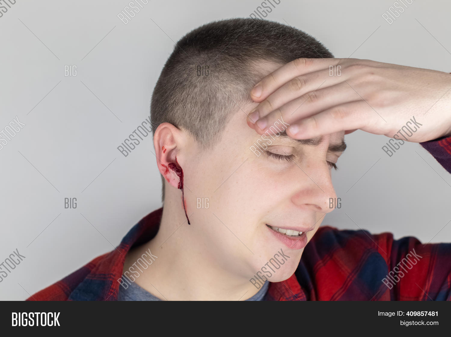Man Whose Ear Bleeding Image & Photo (Free Trial) | Bigstock