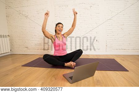 Attractive Woman On Laptop In Virtual Online Fitness Class Working Out ...