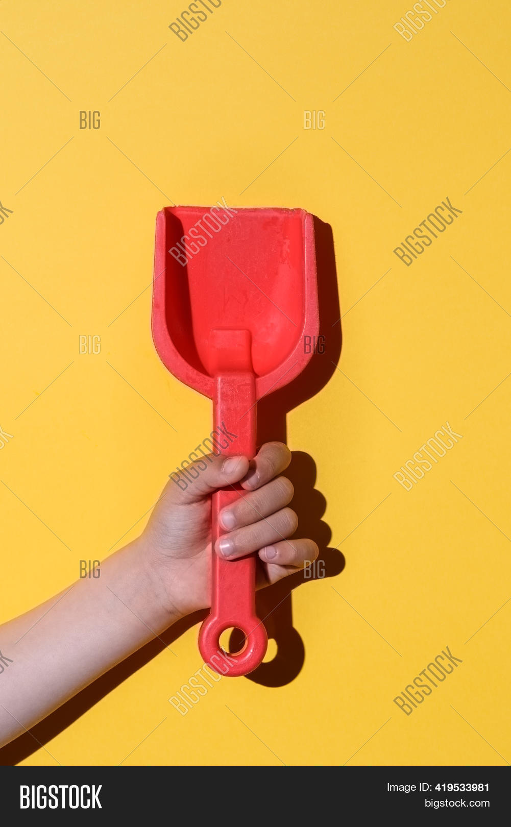 Red Plastic Shovel On Image & Photo (Free Trial) | Bigstock