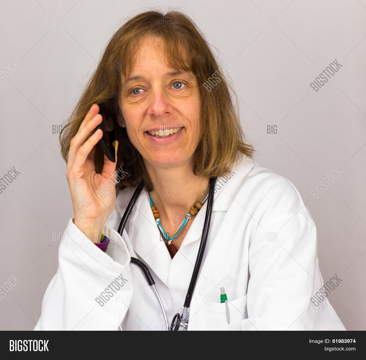 Female Doctor Phones Image & Photo (Free Trial) | Bigstock