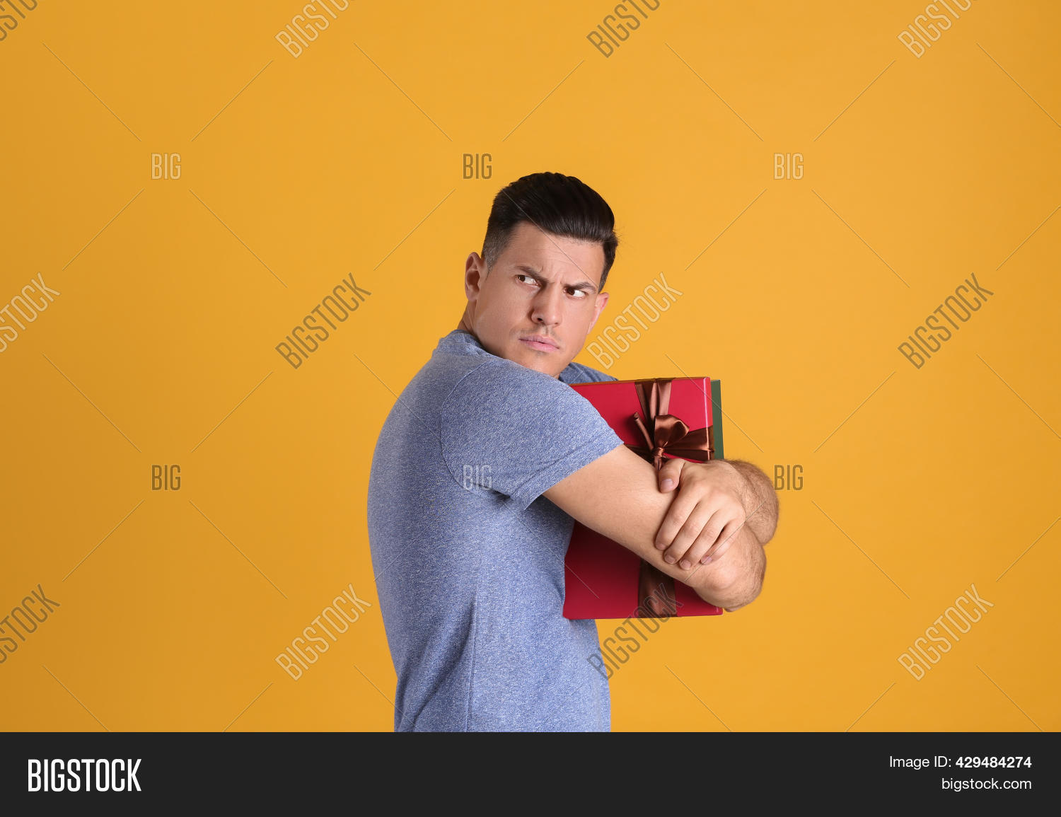 Greedy Man Hiding Gift Image & Photo (Free Trial) | Bigstock