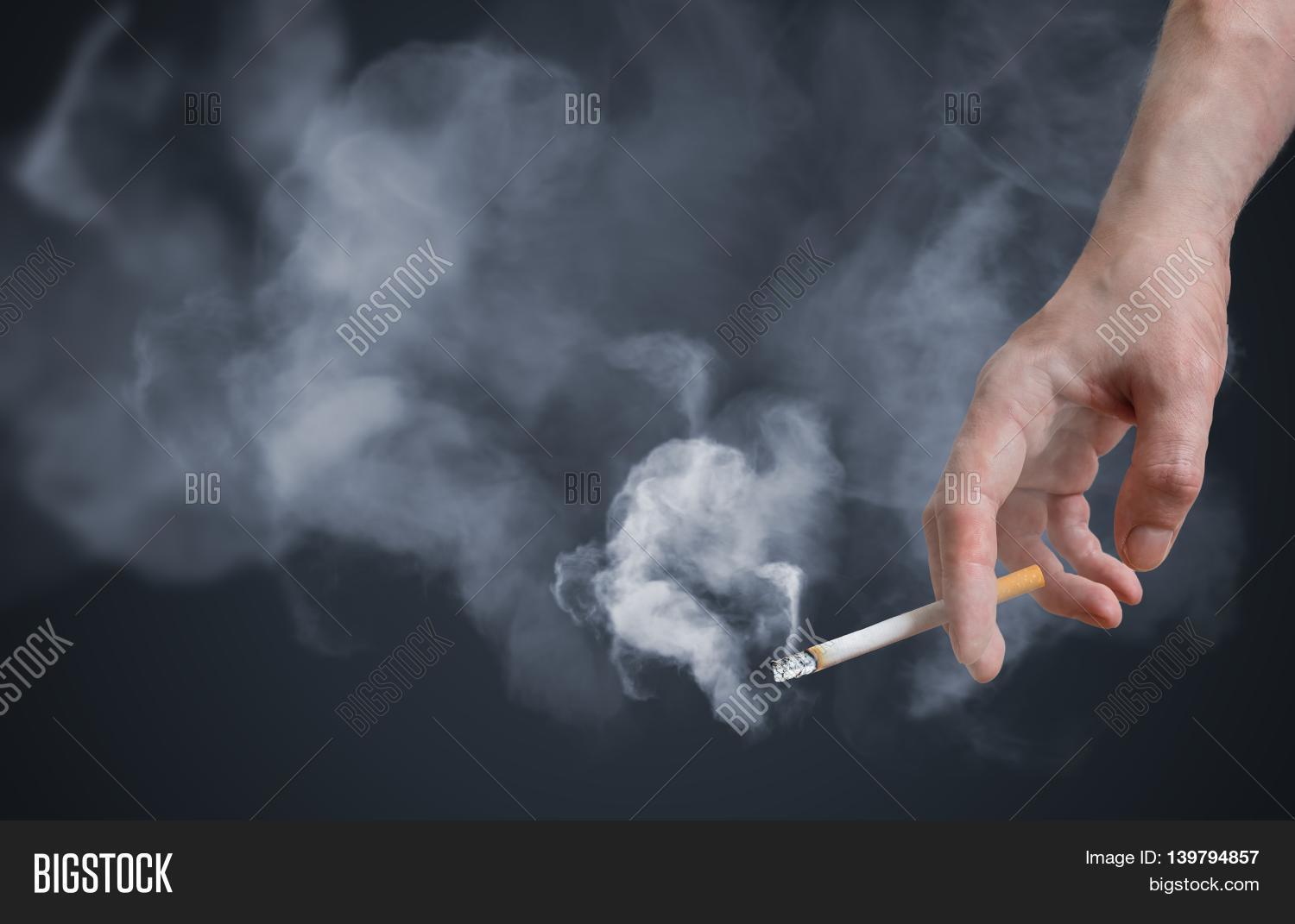 Smoker Holding Smoking Image & Photo (Free Trial) | Bigstock