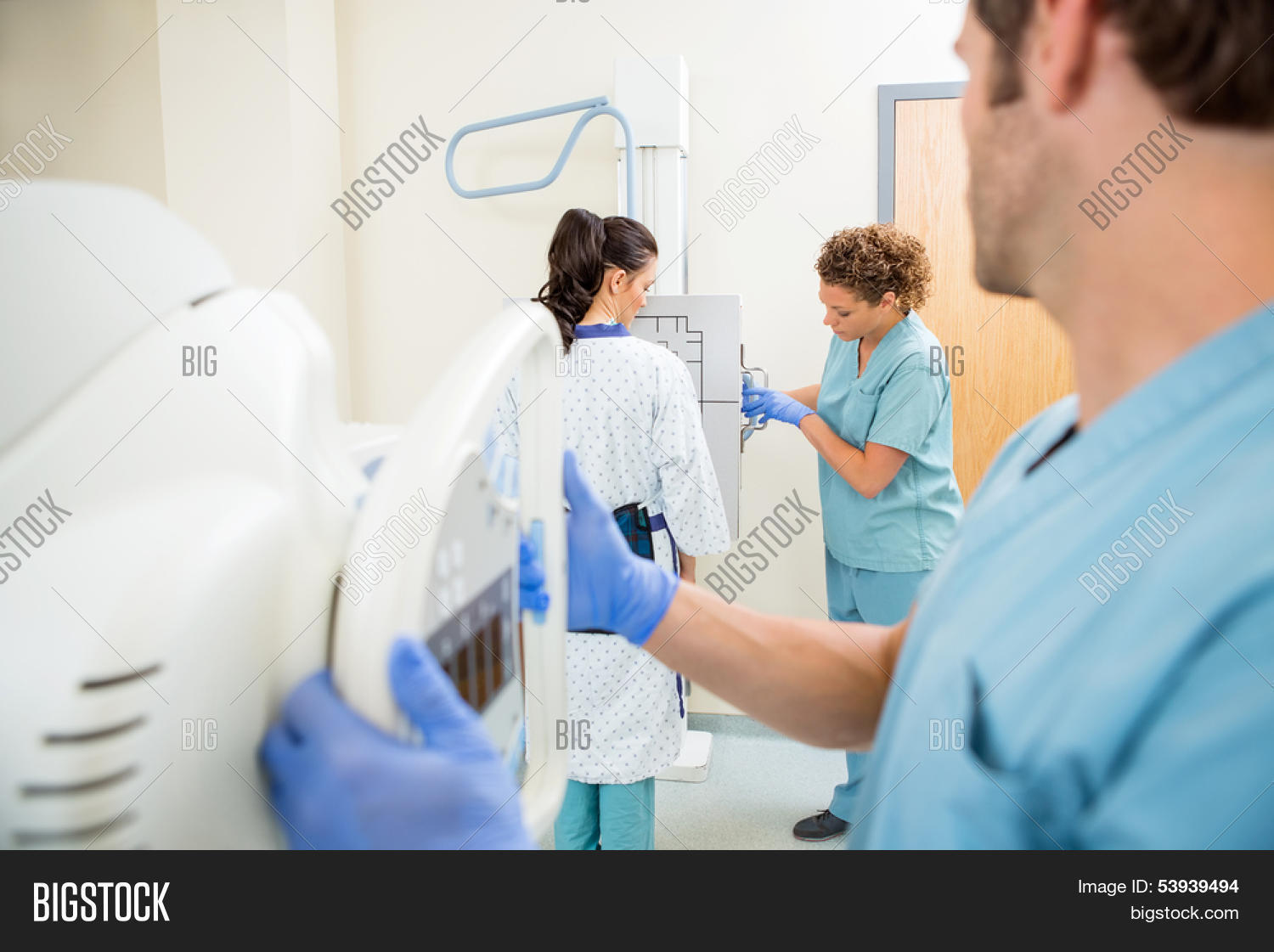 Nurses Adjusting Chest Image & Photo (Free Trial) | Bigstock