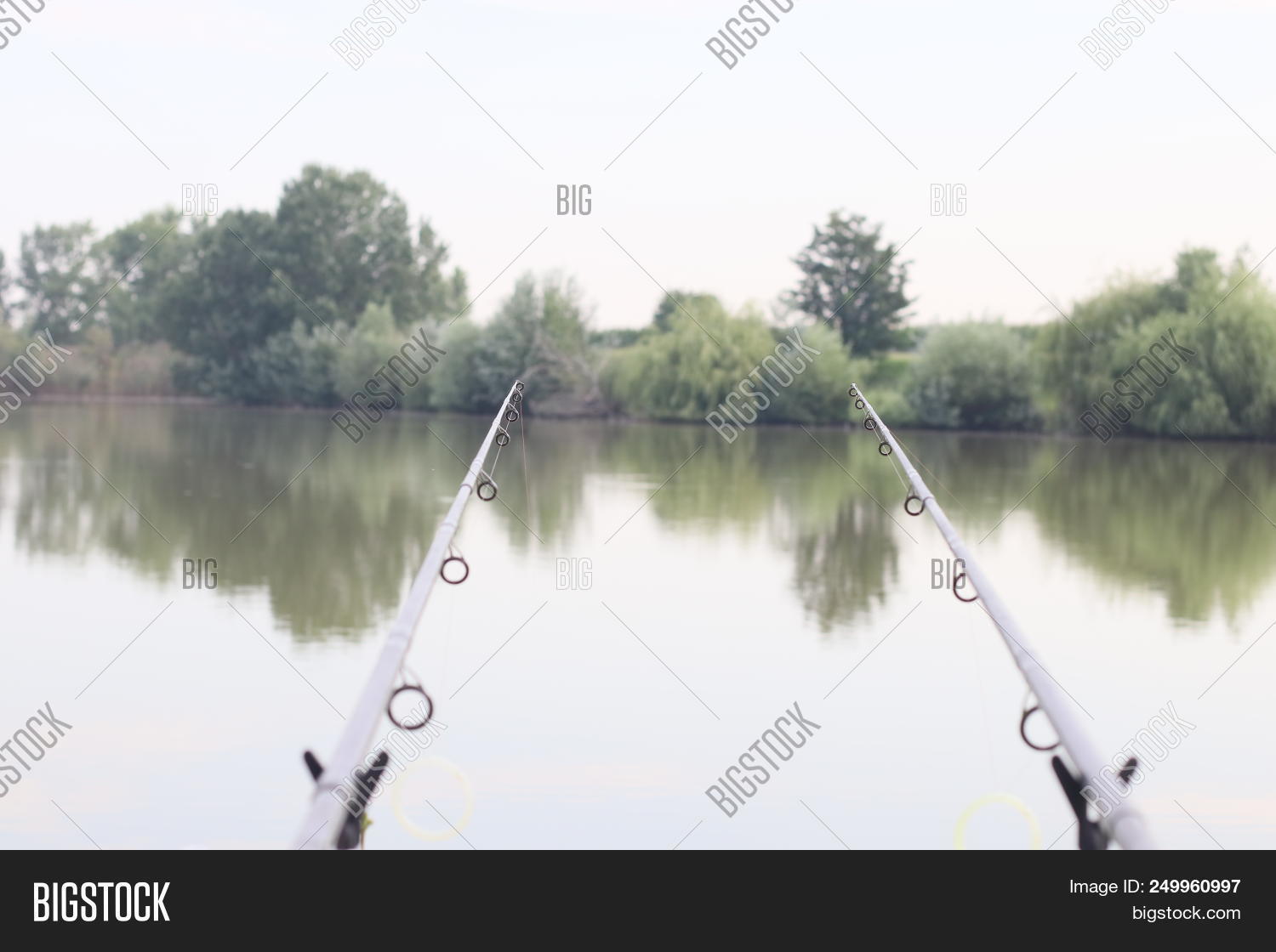 Fishing Rods On Lake Image & Photo (Free Trial) | Bigstock