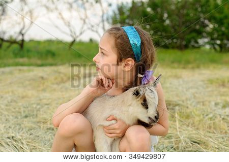 Girl Baby Goat On Farm Image & Photo (Free Trial) | Bigstock