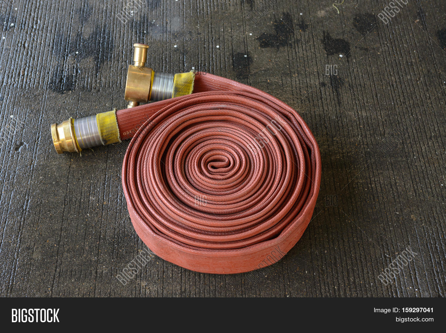 Fire Hose On Rough Image & Photo (Free Trial) | Bigstock