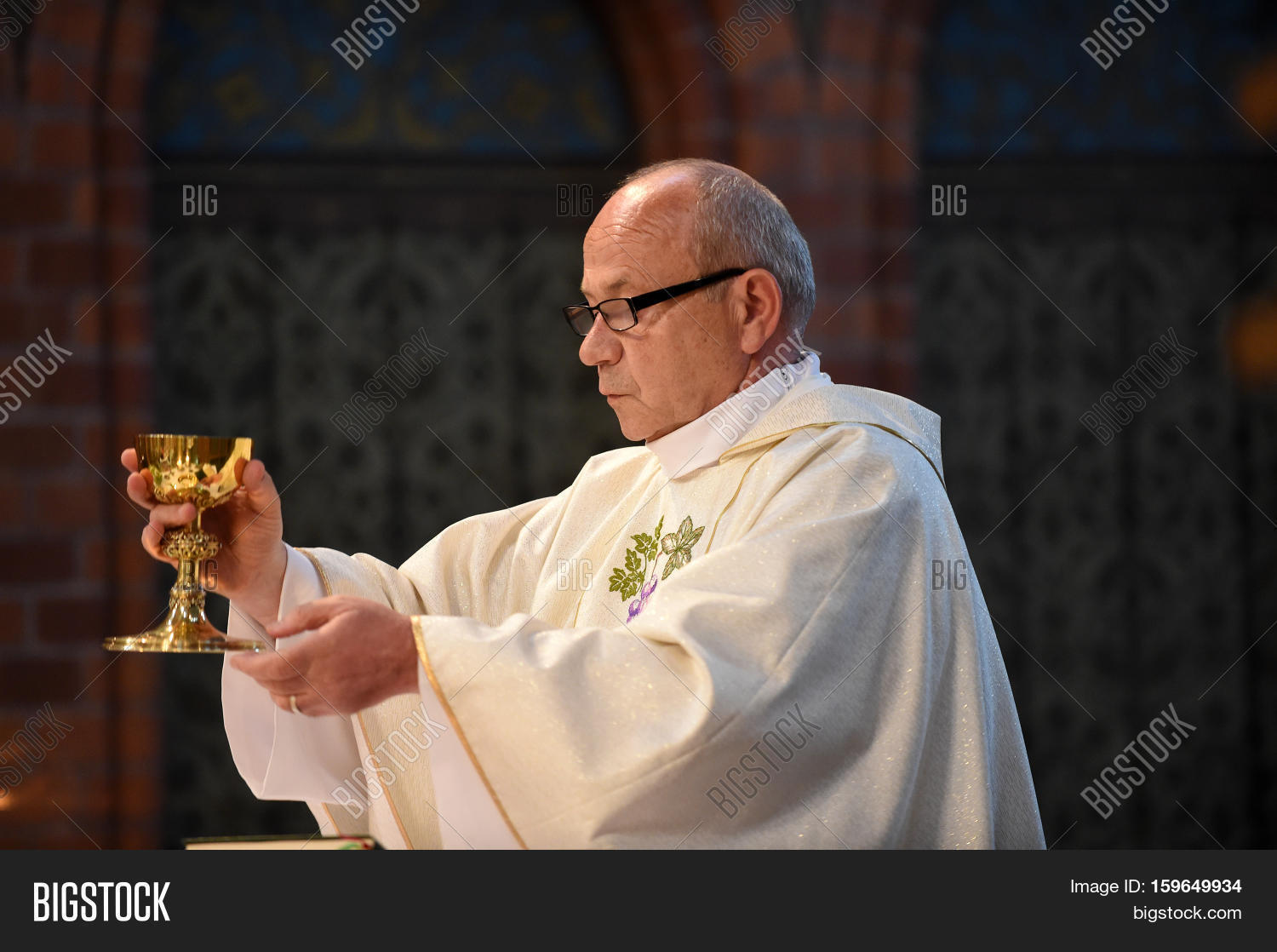 Catholic Priest Image & Photo (Free Trial) | Bigstock