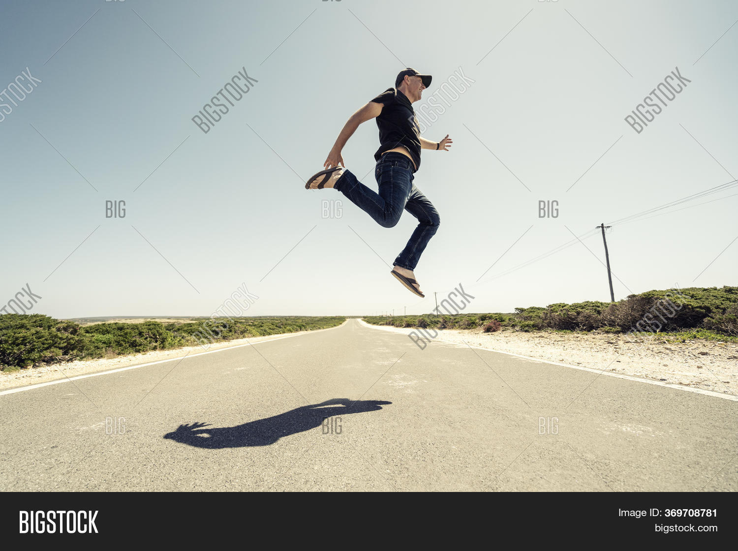 Man Happily Jumping Image & Photo (Free Trial) | Bigstock