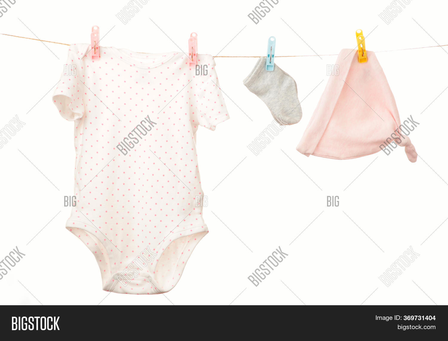 Baby Clothes Hanging Image & Photo (Free Trial) | Bigstock