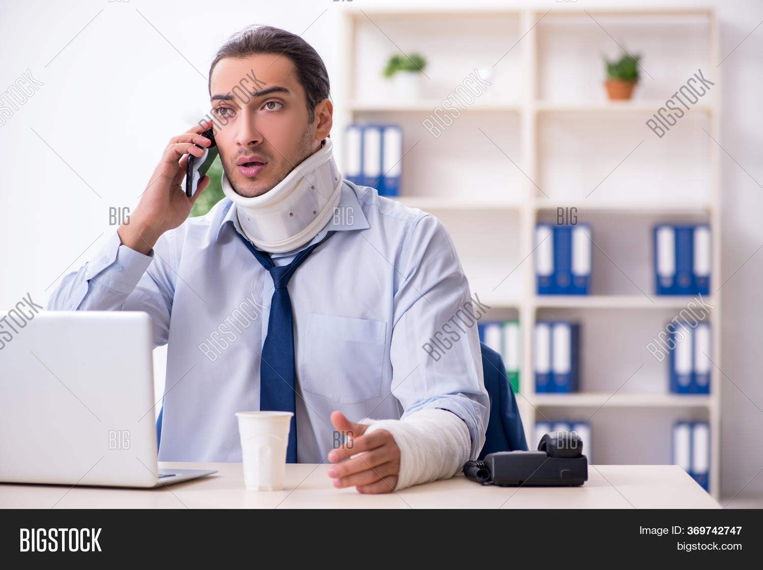 Injured Male Employee Image & Photo (Free Trial) | Bigstock