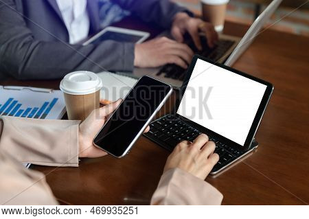 People Using And Looking At Mockup Laptop Computer On Wooden Table ...