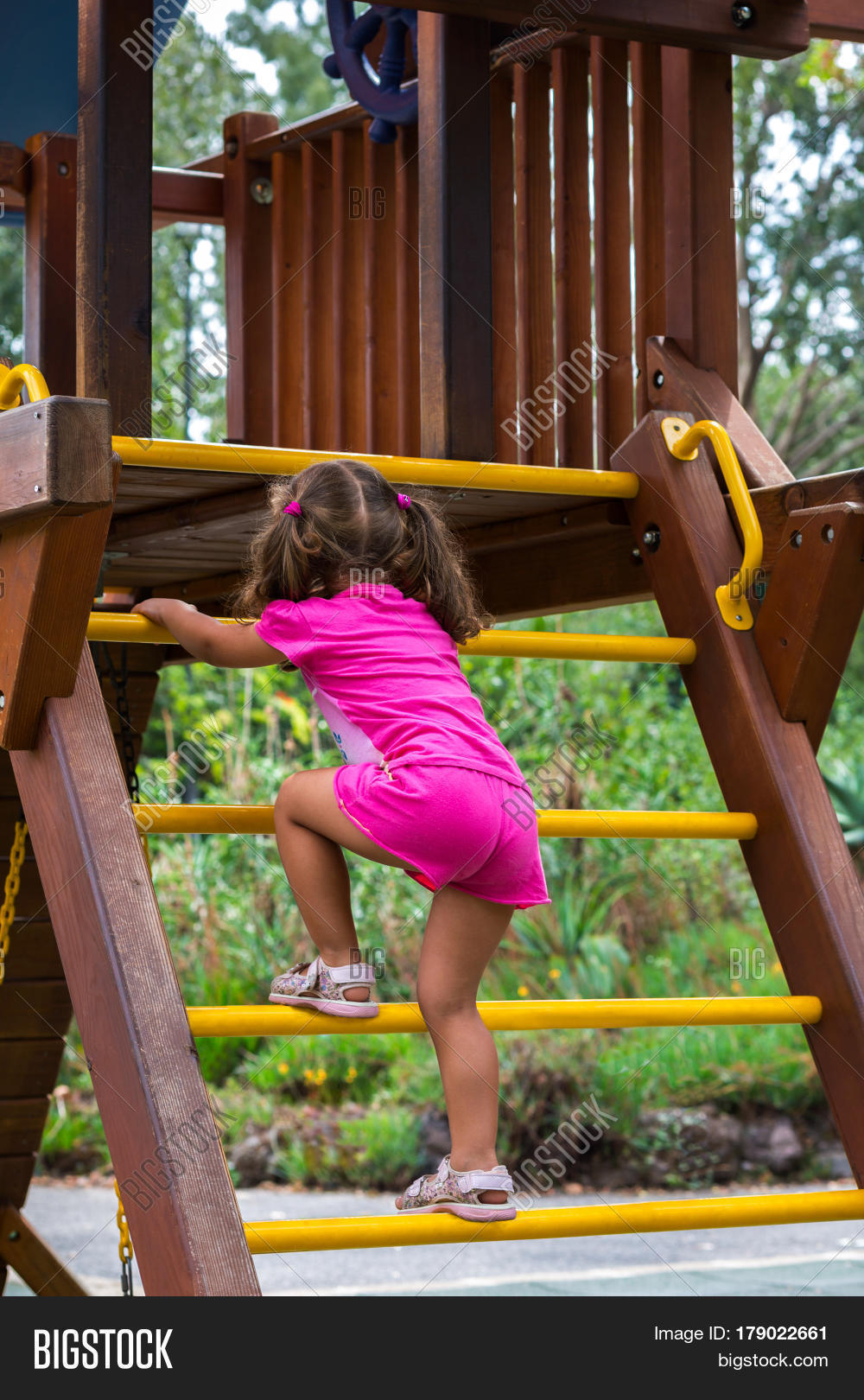 Little Girl Climbing Image & Photo (Free Trial) | Bigstock