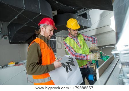 Workers Making Final Image & Photo (Free Trial) | Bigstock