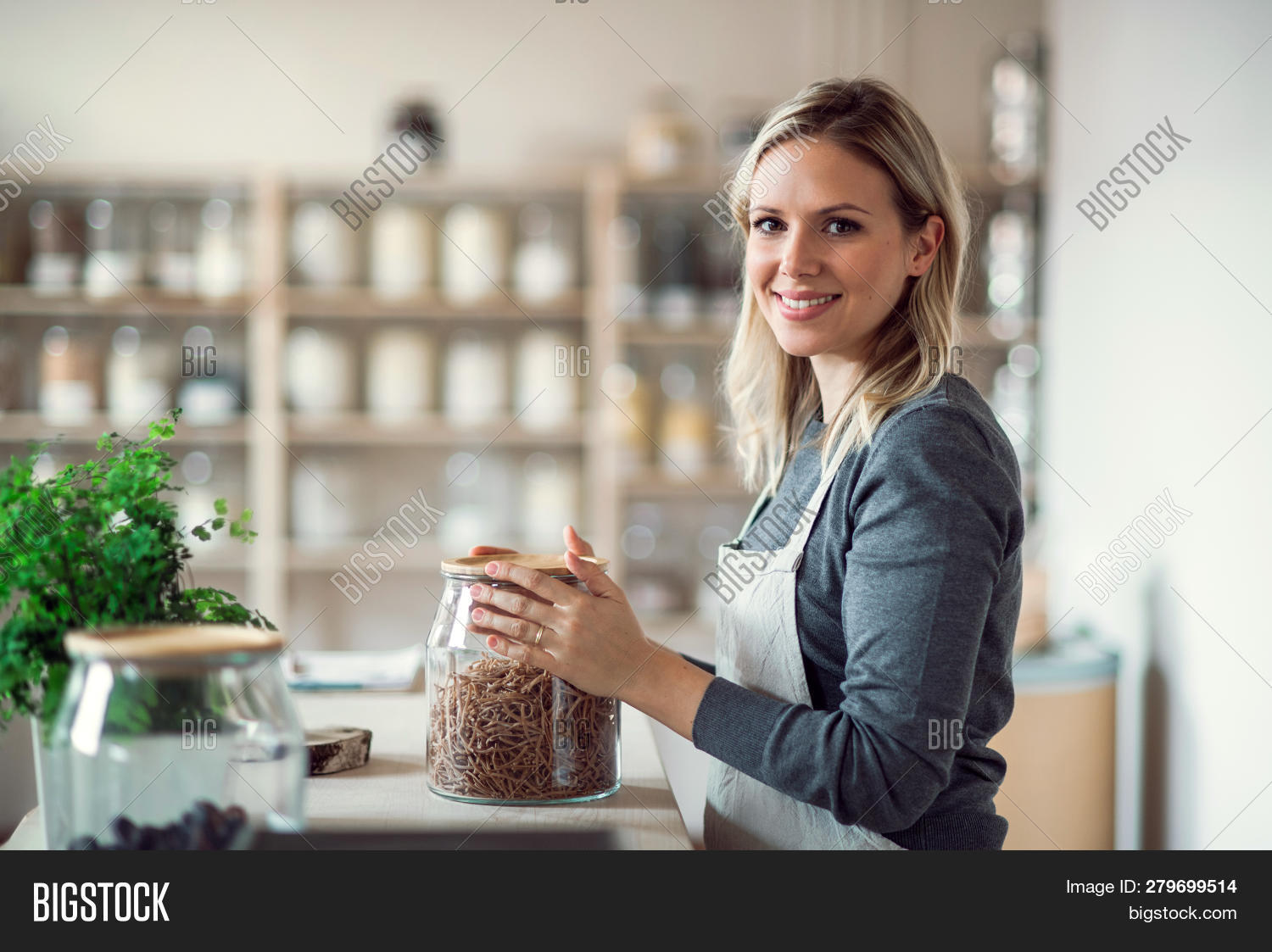Female Shop Assistant Image & Photo (Free Trial) | Bigstock