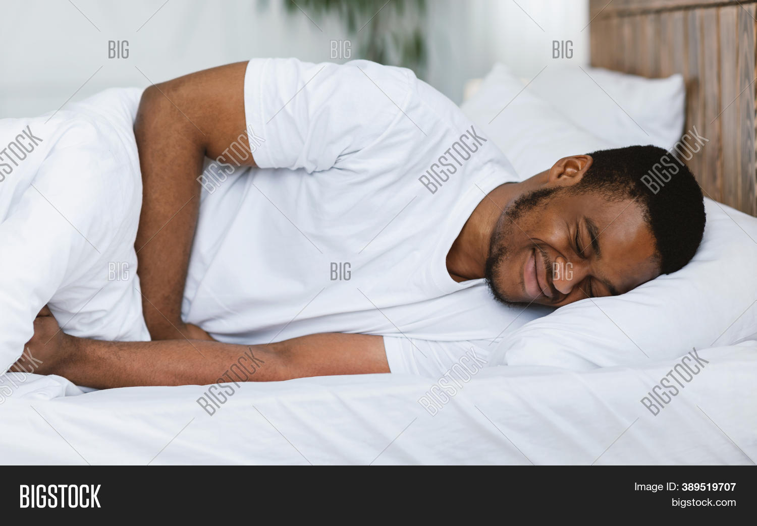 Stomachache. African Image & Photo (Free Trial) | Bigstock