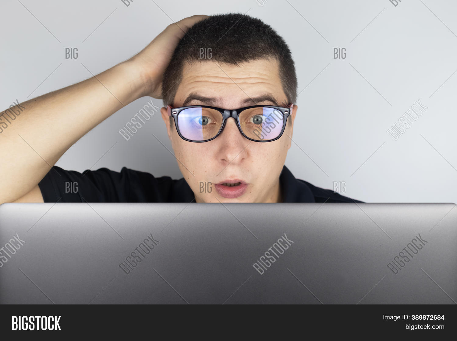 Man Looks Laptop Image & Photo (Free Trial) | Bigstock