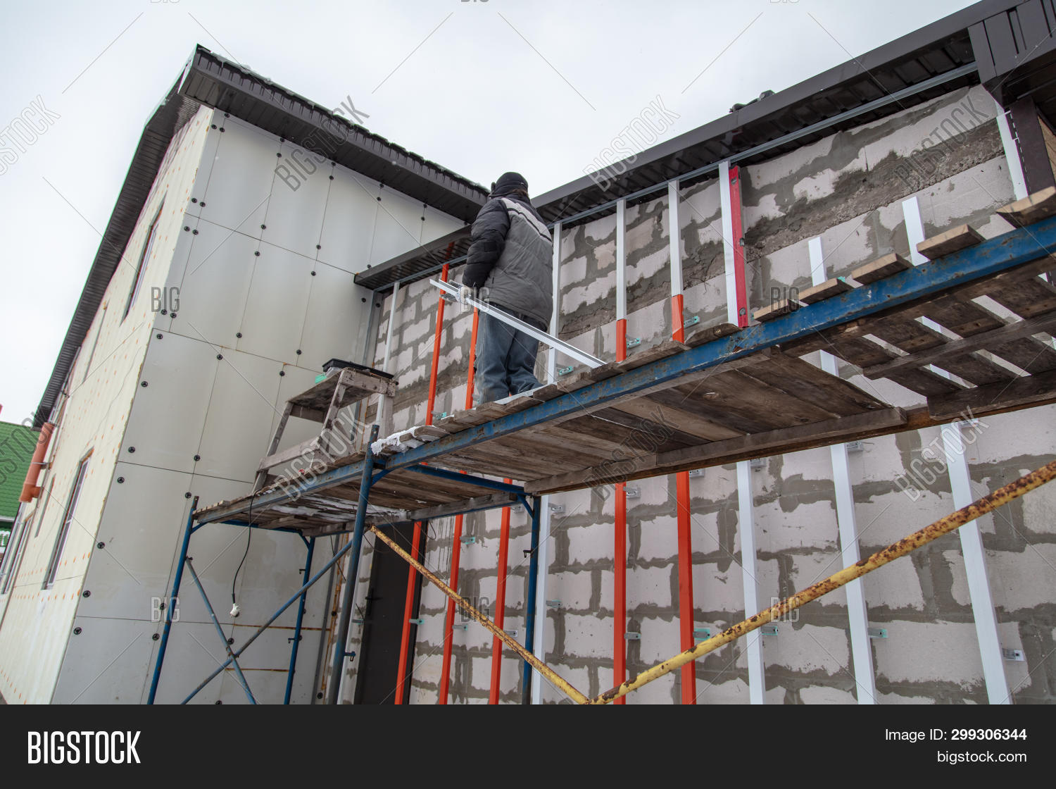 Worker Installs Metal Image & Photo (Free Trial) | Bigstock