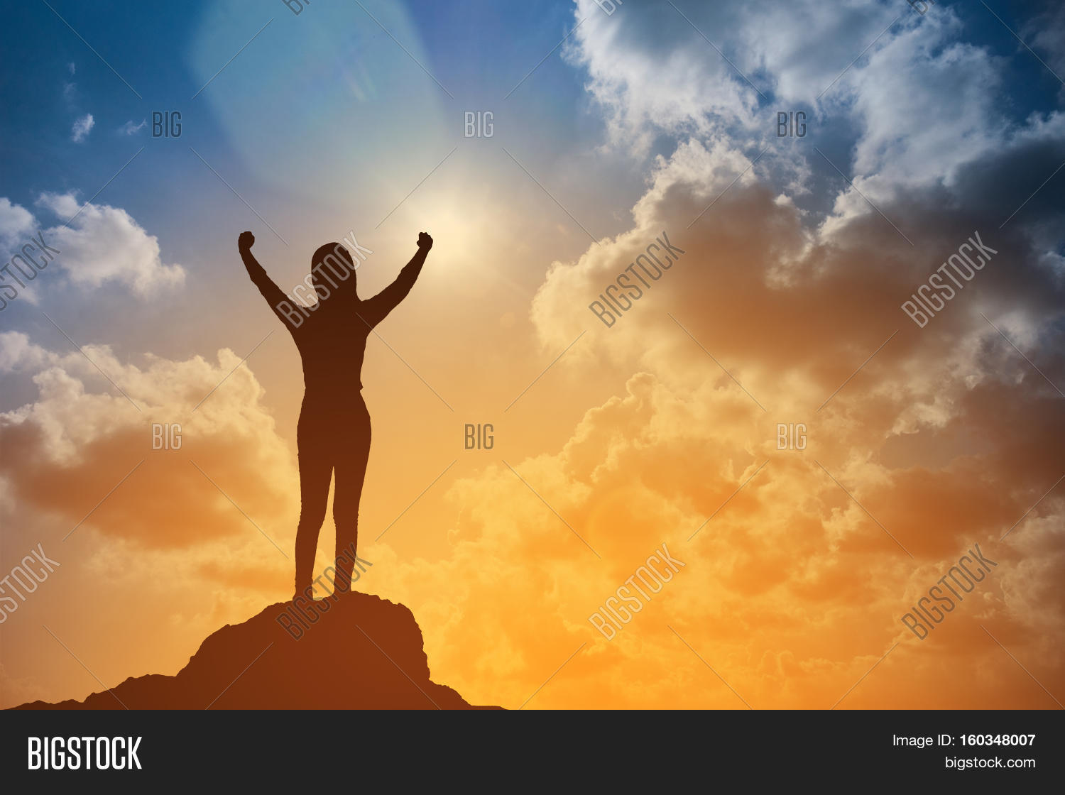 Silhouette Of Winning Success Woman At Sunset Or Sunrise Standing And ...