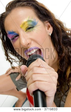 Woman Singing Into Microphone Stock Photo & Stock Images | Bigstock