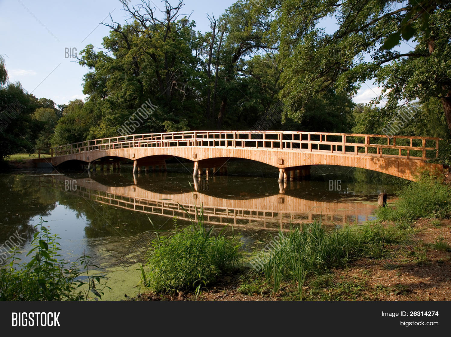 Old wooden bridge over water in the castle park Stock Photo & Stock ...