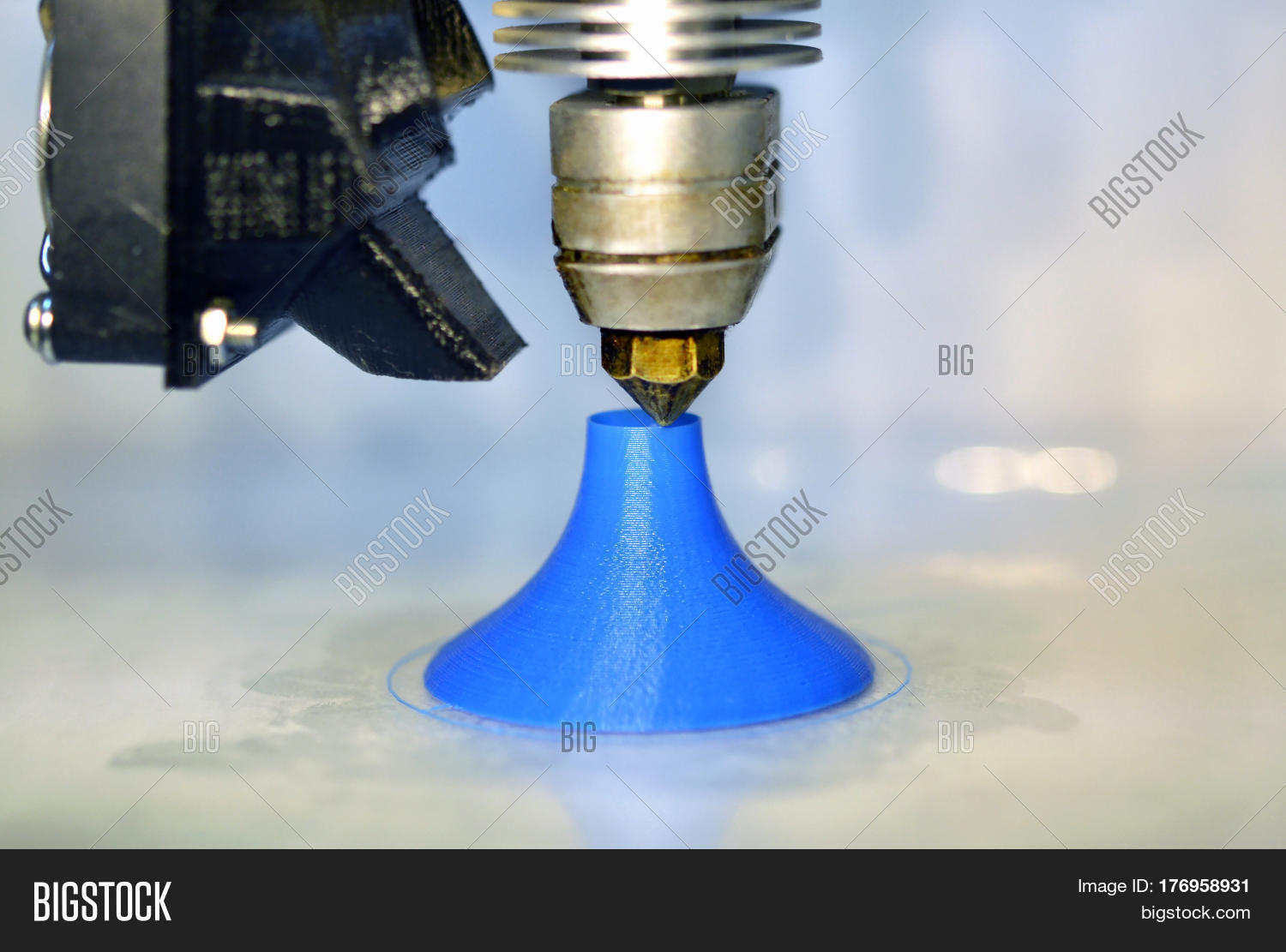 Modern 3D printer printing figure close-up macro.Automatic three ...