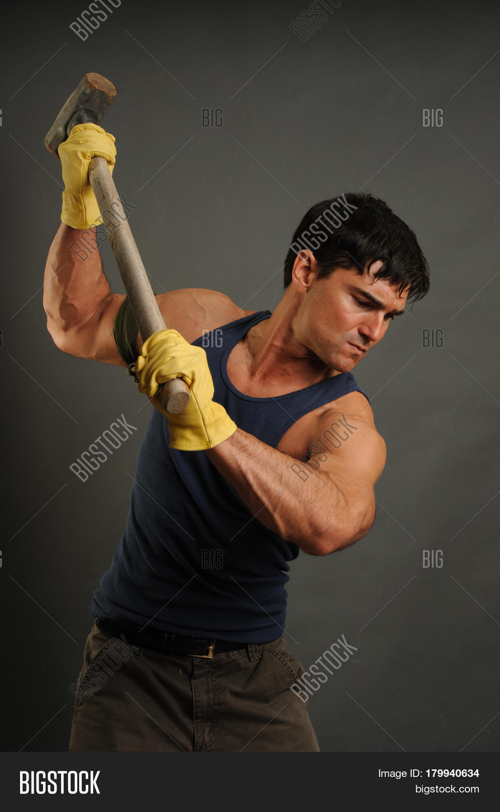 Strong Man Holding Hammer Image & Photo | Bigstock